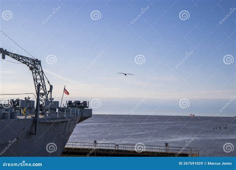 The Uss Alabama Battleship Surrounded By The Rippling Waters Of Mobile