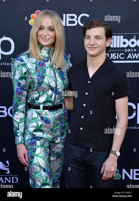 L R Sophie Turner And Tye Sheridan Arrive For The 2019 Billboard
