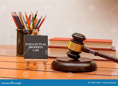Intellectual Property Law Conceptual Photo With Books In Background