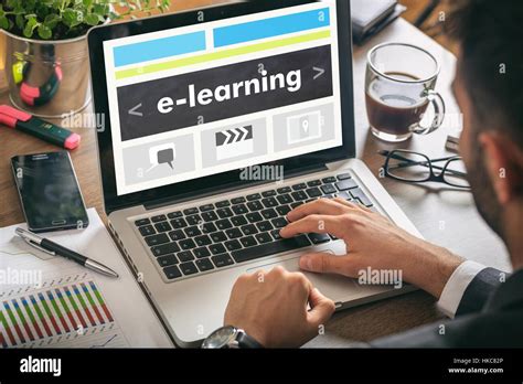 Man Studying On A Laptop Stock Photo Alamy