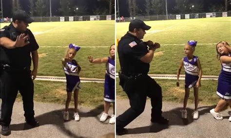 Hilarious Moment Cheerleaders Try To Teach Cop Their Routine After
