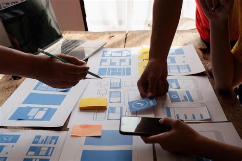 Premium Photo Group Of Ux Developer And Ui Designer Brainstorming