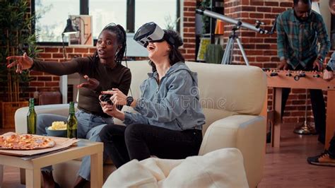 Women Playing Video Games With Vr Glasses On Console Stock Image
