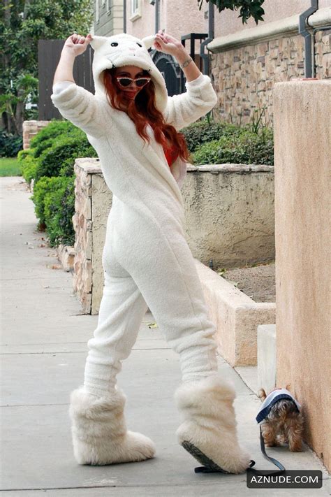 Phoebe Price Wearing A Cat Jumpsuit With Red Lingerie Underneath In
