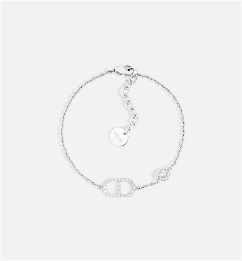 سوار Petit Cd معدن ذهبي وحبّات كريستال بيضاء Dior