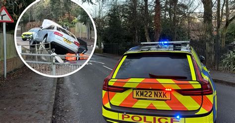 Dramatic Pictures Show Audi Mounted On Barrier After Crash Which Left Person Trapped In Car