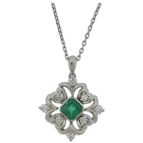 Platinum Diamond And Emerald Shield Shaped Pendant For Sale At 1stdibs