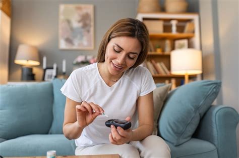 Premium Photo Blood Sugar Testing At Home Checking Blood Sugar Level At Home Diabetic Checking