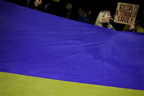 Protestors In Warsaw Accuse Russia Of Terrorism After Missile Strikes