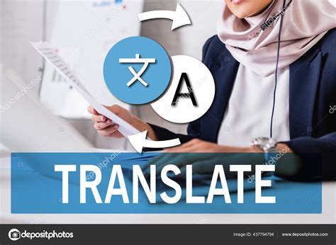 Cropped View Interpreter Holding Documents While Typing Laptop