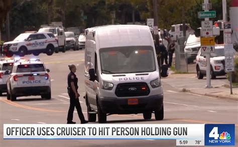 Woman Hit With Police Cruiser After Standing In Street Firing A Gun