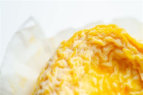 A Yellow Cheese Is Sitting In A Paper Wrapper Stock Photo Image Of