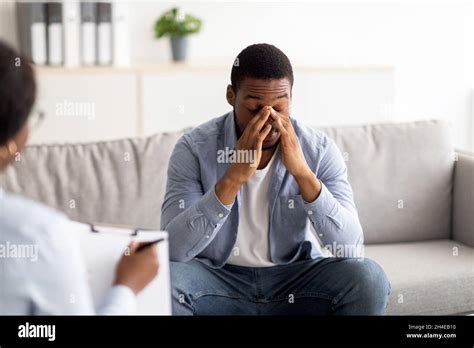 Stressed Black Guy Having Session At Psychologist S Office Receiving