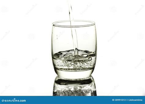 Water Being Poured Into A Glass Cup Stock Image Image Of Bubble
