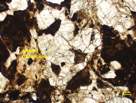 Photomicrograph Of Pegmatite Displaying Quartz Altered Microcline And