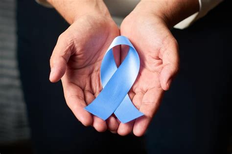 Premium Photo Blue Ribbon For The Awareness Campaign For The World