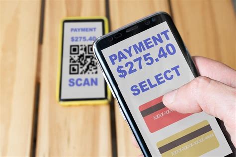 Premium Photo A Smartphone Scanning The Qr Code On Another Smartphone To Make An Electronic