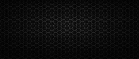 Black Backdrop With Metal Hexagonal Wire Dark Background With Carbon