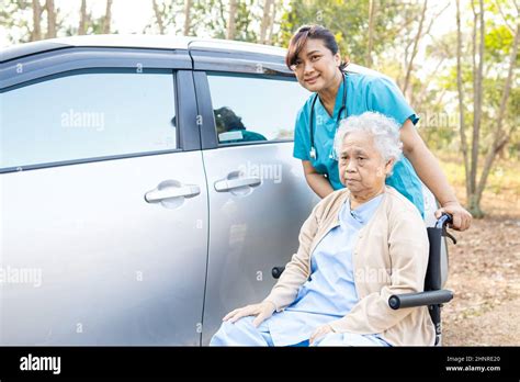 Doctor Help And Care Asian Senior Or Elderly Old Lady Woman Patient