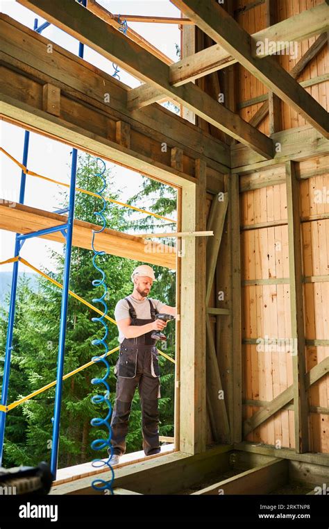 Carpenter Constructing Wooden Framed House Bearded Man Worker Cladding