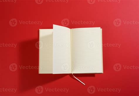 open notebook with blank white sheets on red background 19034030 stock
