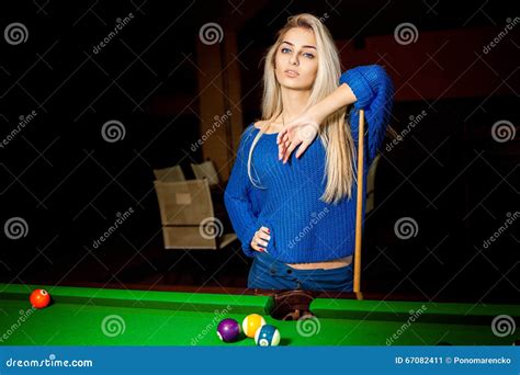 Cutie Young Blonde With Blue Eyes Plays Pool Billiard Stock Image
