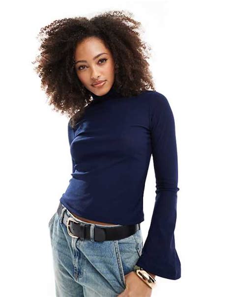 Asos Design Flute Sleeve Roll Neck Top In Navy Asos