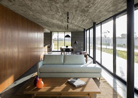 Mapas Xan House In Brazil Combines Raw Concrete With Slatted Timber