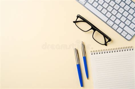 Office Desk With Computer Keyboard Glasses Notebook And Pen Top View With Copy Space Stock
