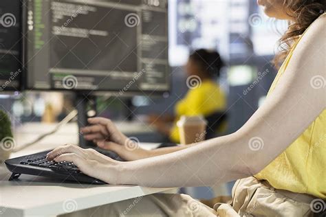 Programmer Typing On Computer Conducting Tests To Optimize Machine Learning Stock Image Image