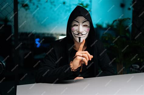 Premium Photo Portrait Of Unrecognizable Hacker Man Wearing Anonymous Mask And Hoodie