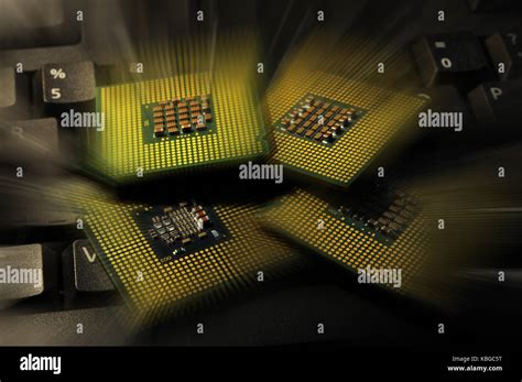 Close Up Of Computer Processor Cpu On A Keyboard Background Tecnology