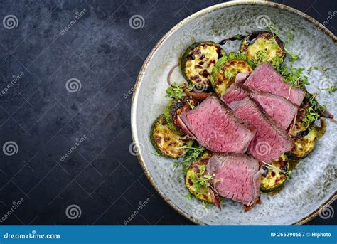Traditional Fried Dry Aged Angus Beef Filet Medaillons With Zucchini