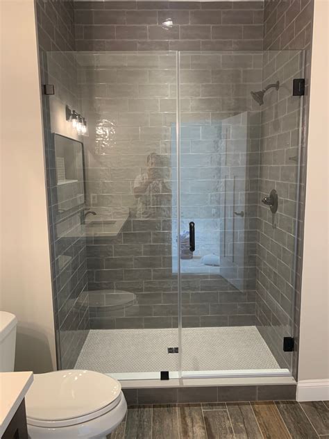 Modern Glass Company Frameless Seamless Sliding Glass Shower Doors In
