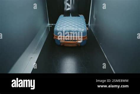 Security Checkpoint In Airport Terminal Suitcases And Bags Of Passengers Moving On Conveyor