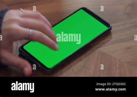 Girls Manually Typing Text On The Phonephone On The Tablegreen Screenchroma Key Stock Video