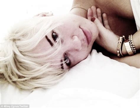 Miley Cyrus Tweets Incessantly Photos Of Herself Daily Mail Online