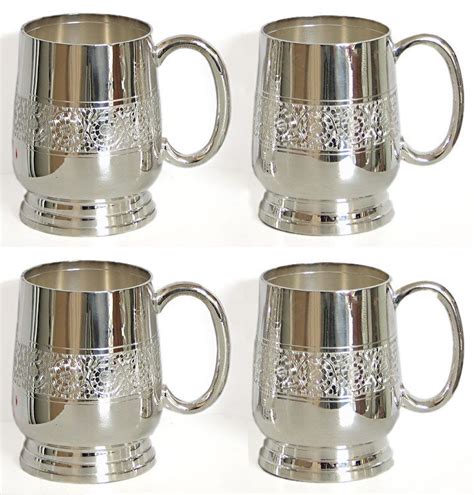 Four Silver Plated Cups