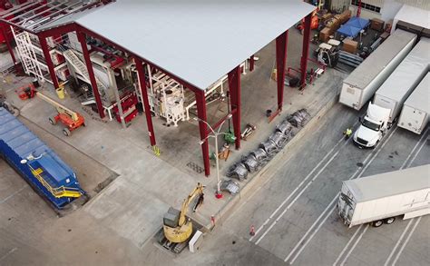 Drone Flyover Of Teslas Massive New Casting Machine Shows New Parts
