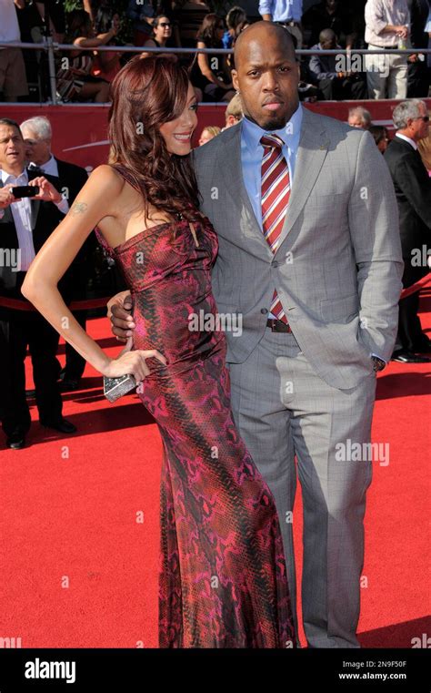 Baltimore Ravens Linebacker Terrell Suggs Right And Candace Williams