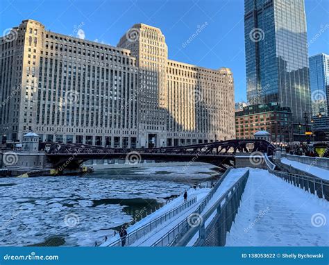 Chicago Winter Featuring Snow Covered Riverwalk Ice Chunks On River