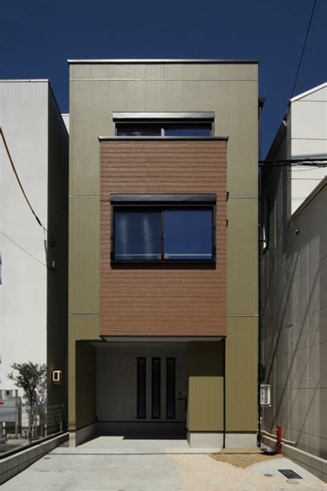 カーキ色にこだわり木目やコンクリート調の素材がお洒落な外観 事例写真「3floor Olive Green House」｜注文住宅のハウスネットギャラリー