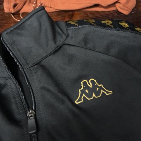 Black And Gold Kappa Track Jacket Tagged Large Depop