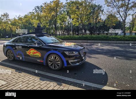 An Apollo Go Robotaxi Drives On A Road In Beijing China 14 October