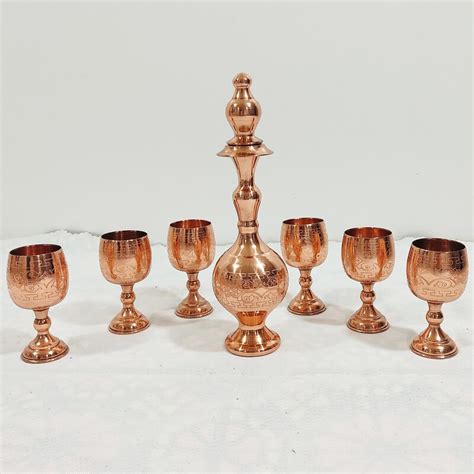 خرید و قیمت تنگ در دار همراه شش جام کوچک تمام مسی طرح دار همگی رنگ ثابت