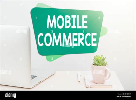 Writing Displaying Text Mobile Commerce Word Written On Using Mobile