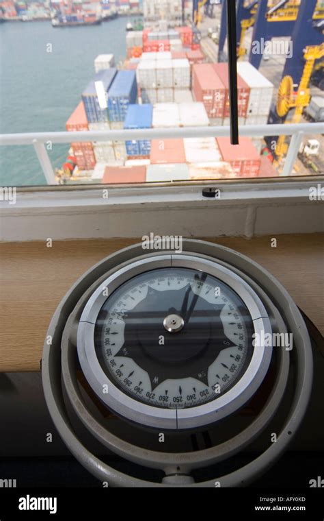 Magnetic Compass On Brigde Of Container Ship With Containers Being Off
