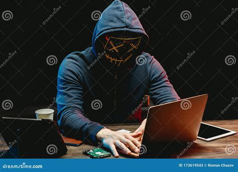 anonymous hacker man with laptop stock image image of anonymous