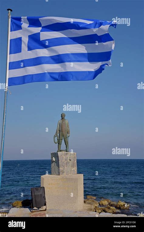 Afanis Naftis Unsung Sailor Monument With Greek Flag Flying Overhead