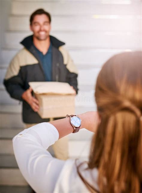 Delivery Man Late And Customer With Time Check For Box Of Groceries At